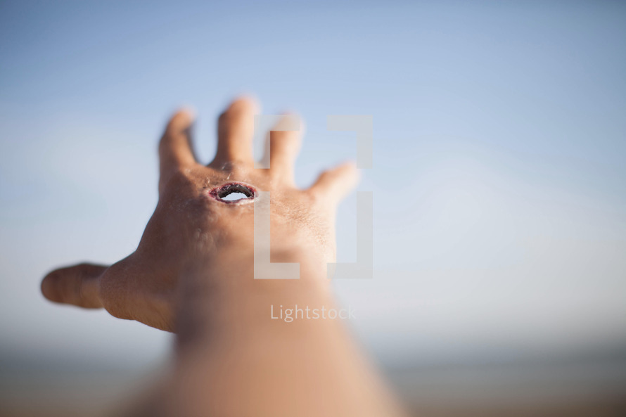 Stock Photo - Jesus' nail - scarred hands by Pearl - Lightstock