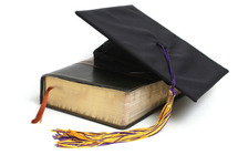 Stock Photo - Graduation cap and a bible by 3G - Lightstock