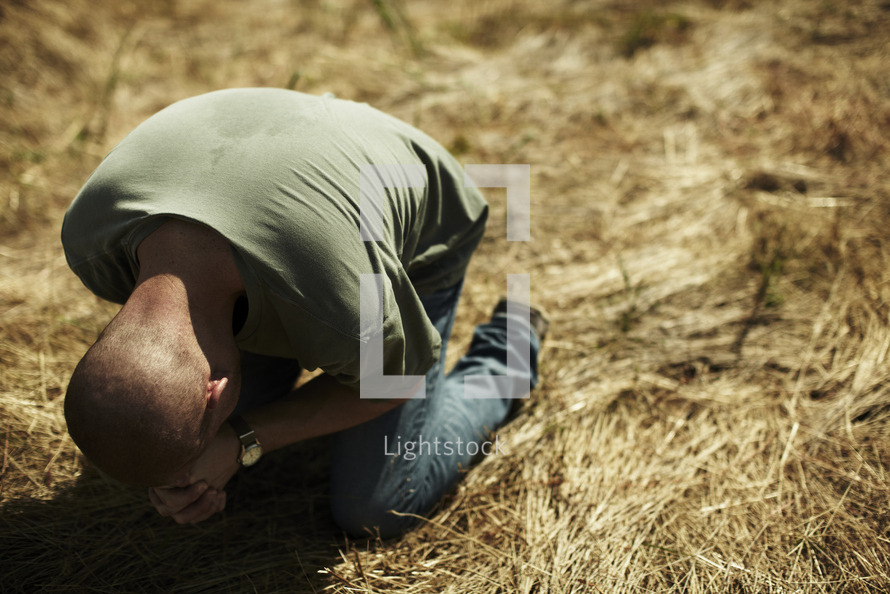 Stock Photo - A desperate man on his knees praying to god by Pearl ...