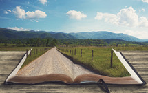 Stock Photo - Road leading to the cross on an open bible at... by ...